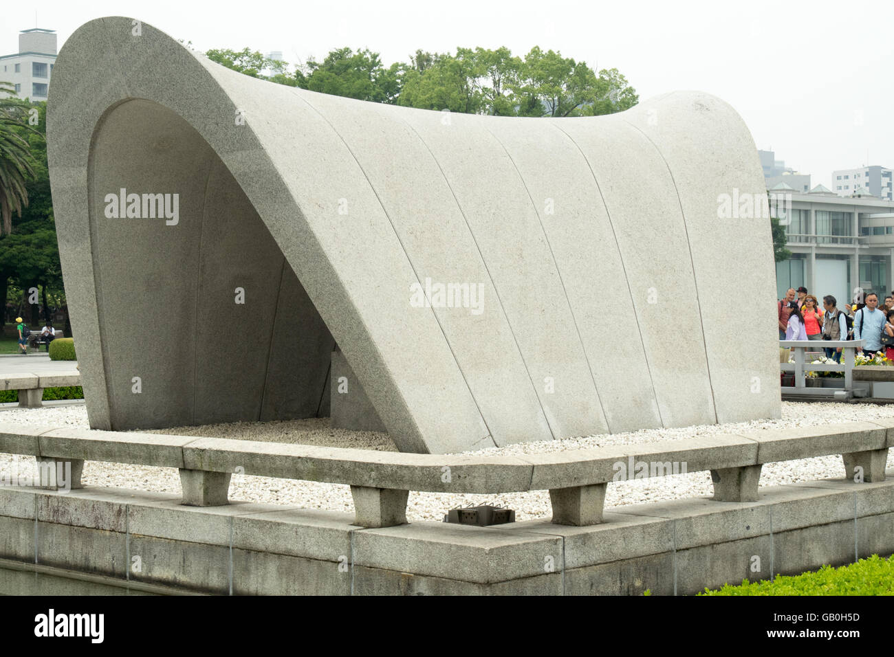 A concrete, saddle-shaped monument that covers a cenotaph at the ...