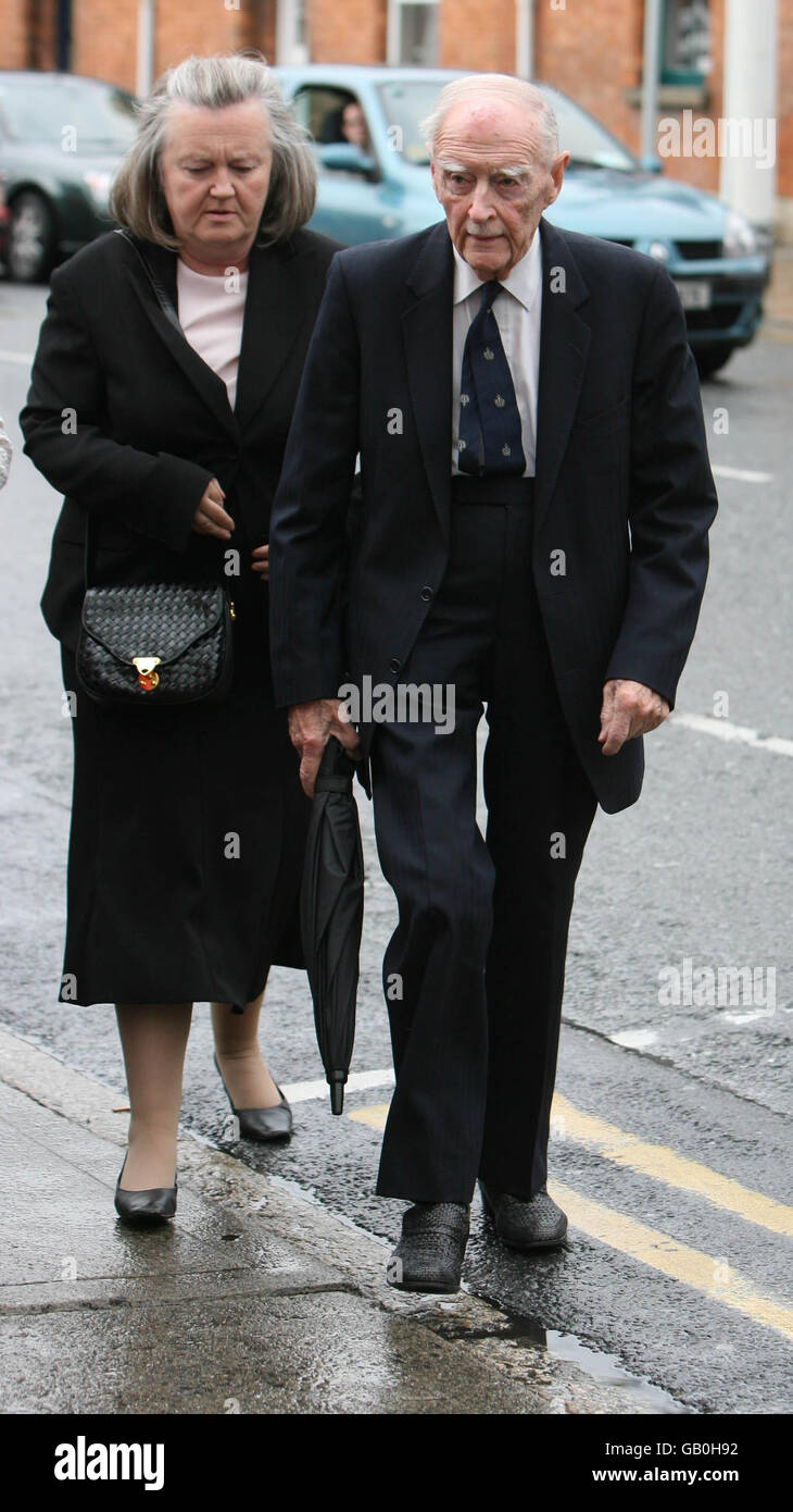 Former Taoiseach Liam Cosgrave (right) attends the removal service of ...