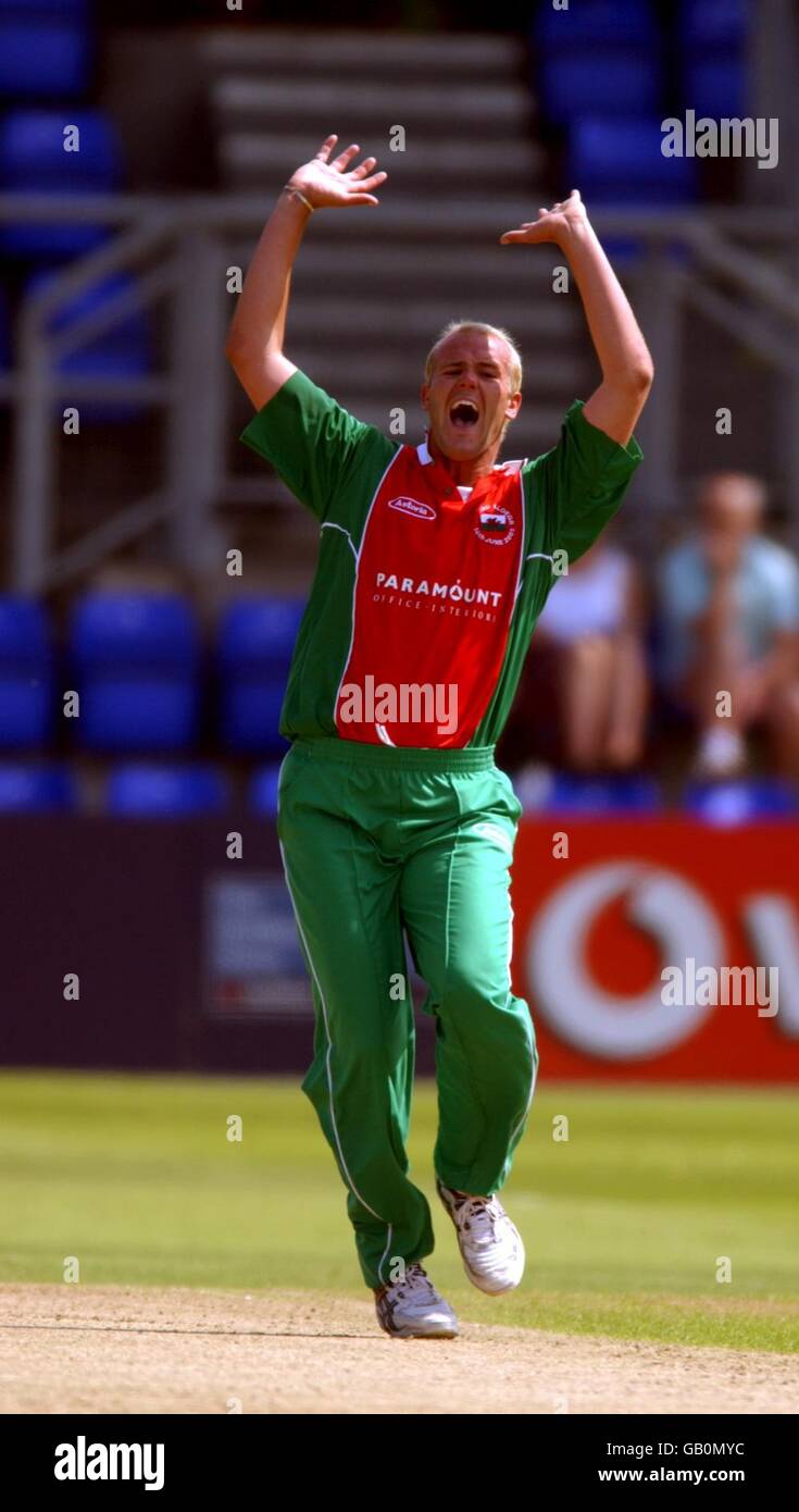 Wales' David Harrison celebrates after getting out England batsman ...