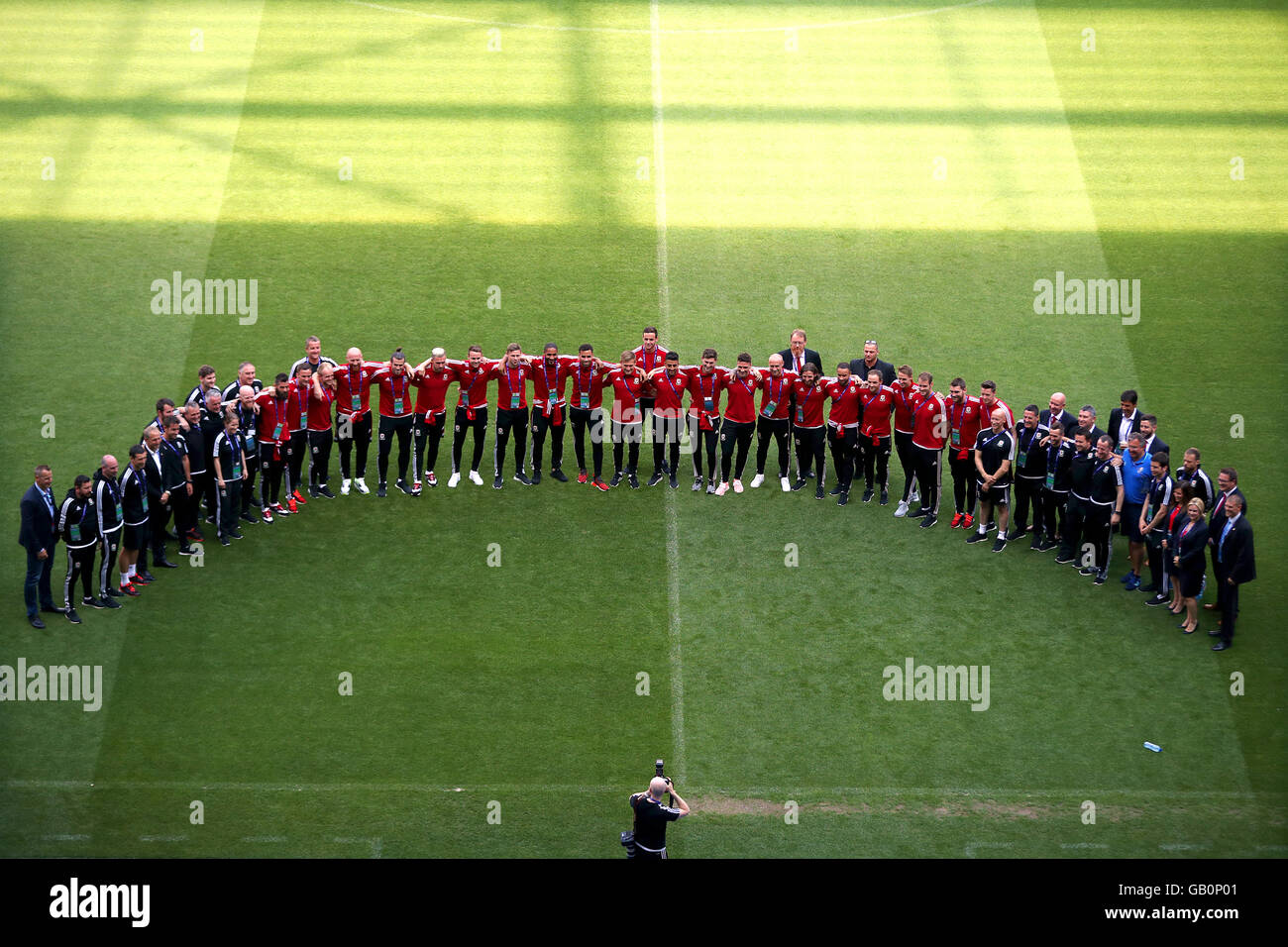 The Wales team and staff members pose for a group photo during the walk ...
