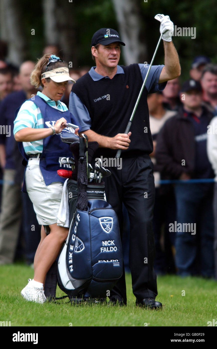 Nick faldo in conversation with his caddy hi-res stock photography and ...