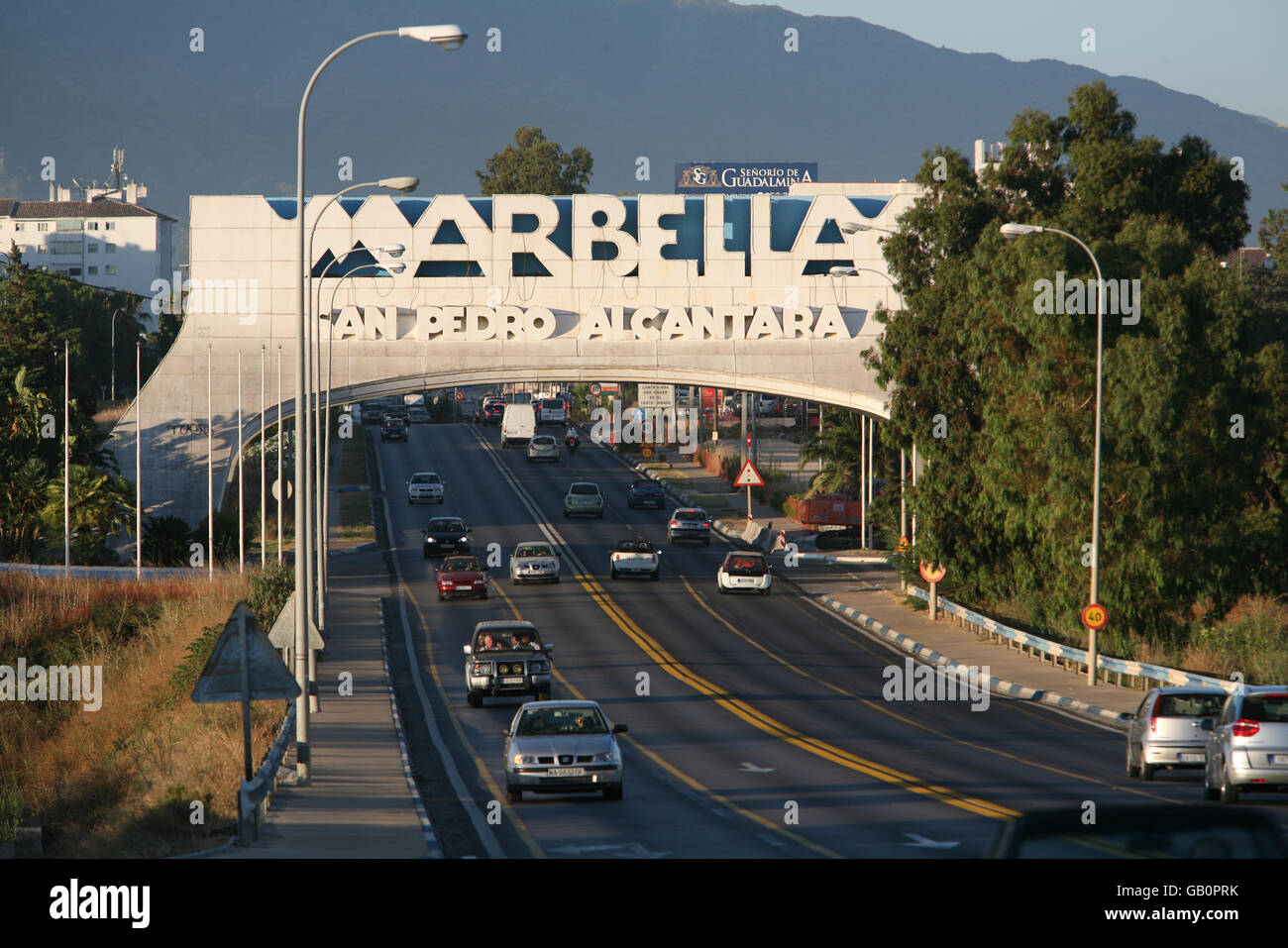 A view of a sign at the entrance to marbella hi-res stock photography ...