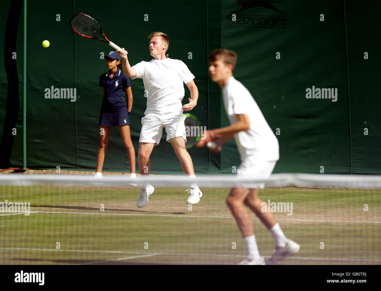 Fin Bass (left) and Alastair Gray in action during the boys doubles on ...