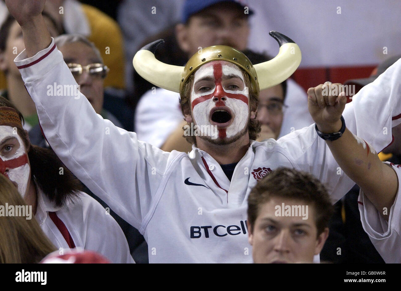 An English fan comes dressed for the occasion and celebrates an English ...