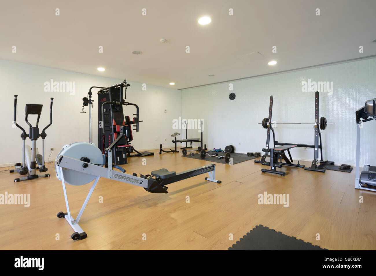 Exercise machines on a home gym Stock Photo - Alamy