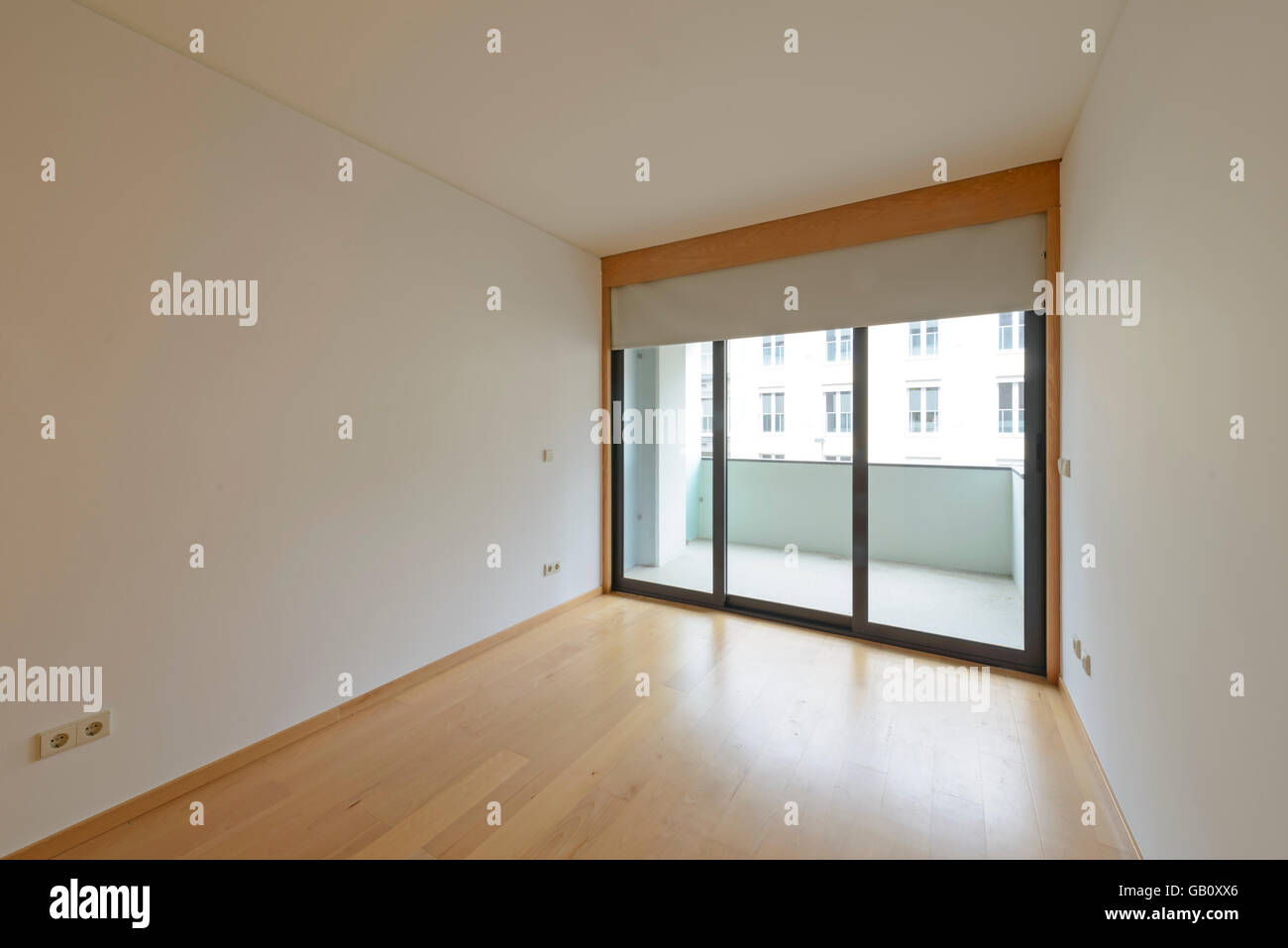 Empty room with big window Stock Photo - Alamy