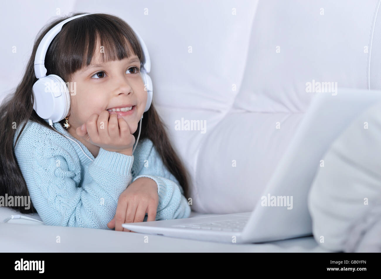 Little girl using computer Stock Photo - Alamy