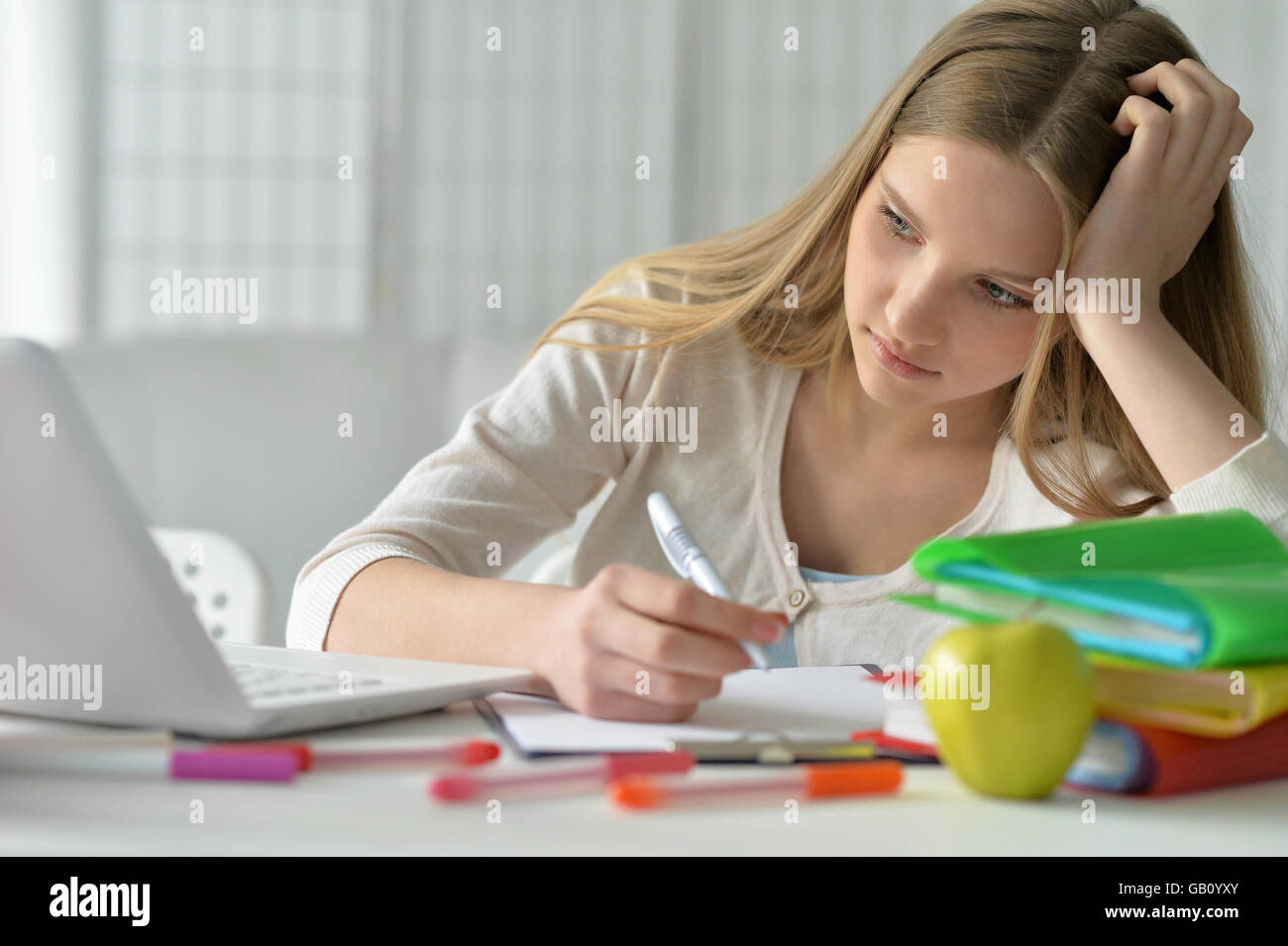 Cute student girl at class Stock Photo - Alamy