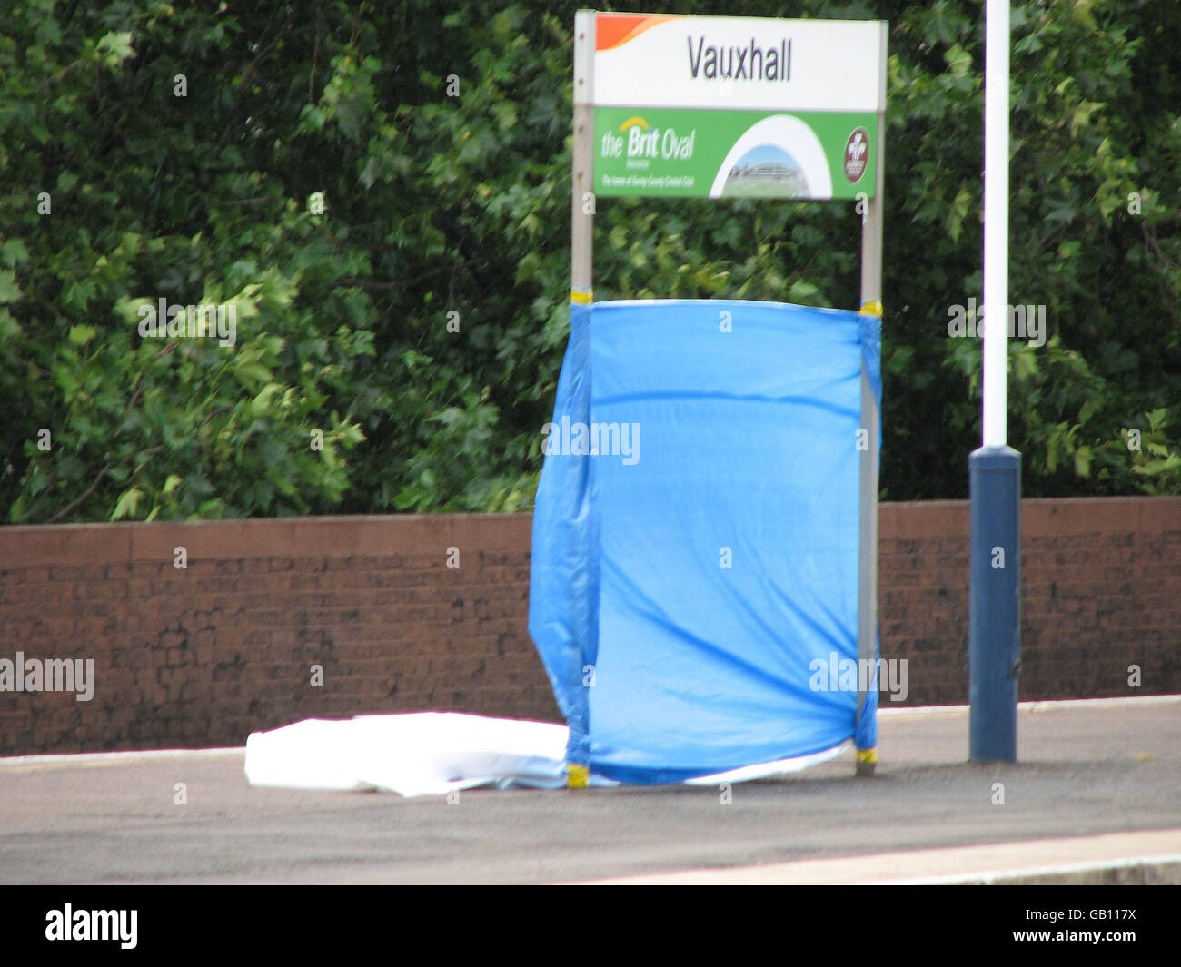 Non-suspicious death. Tarpaulin covers the area where a man died under ...