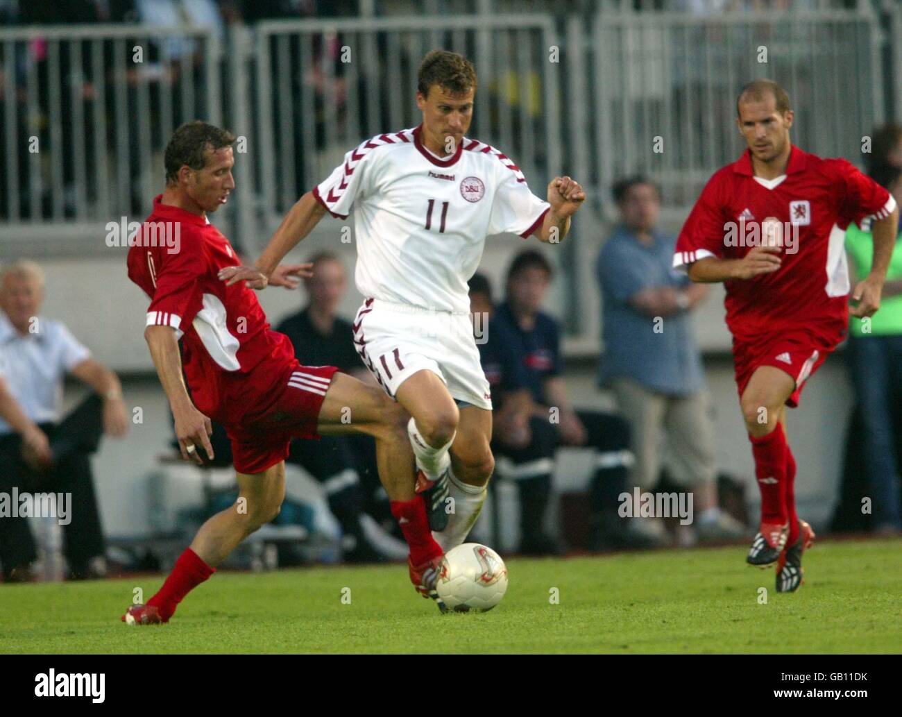 Denmark's Ebbe Sand gets away from Luxembourg's Claude Reiter (l Stock ...