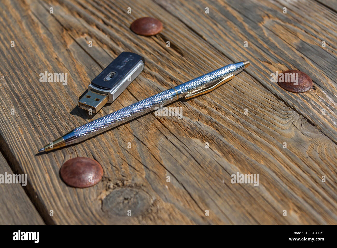 Pen And Flash Drive On Wooden Desk Stock Photo - Alamy