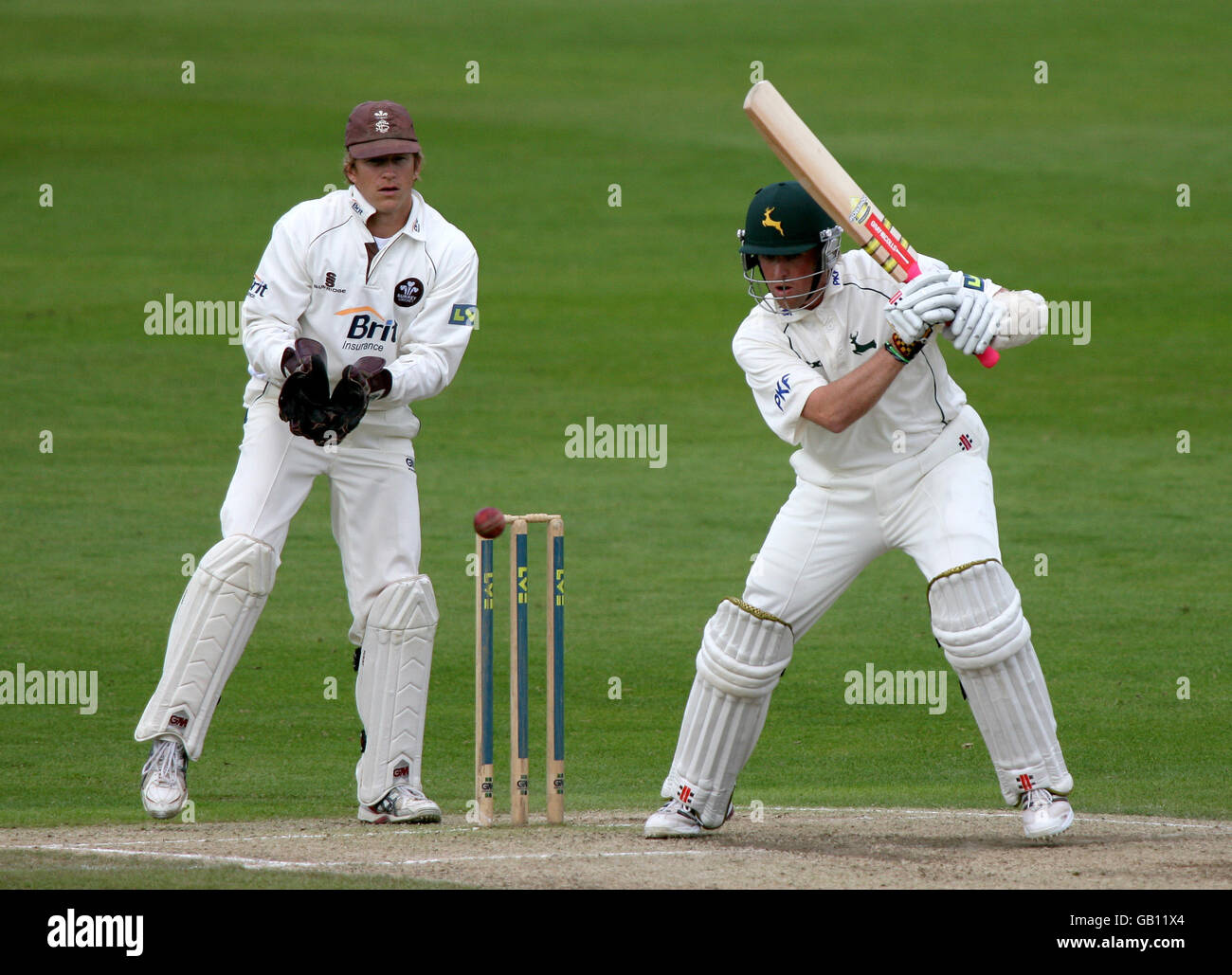 Nottinghamshire's Graeme Swann and Surrey's Jonathan Batty Stock Photo ...