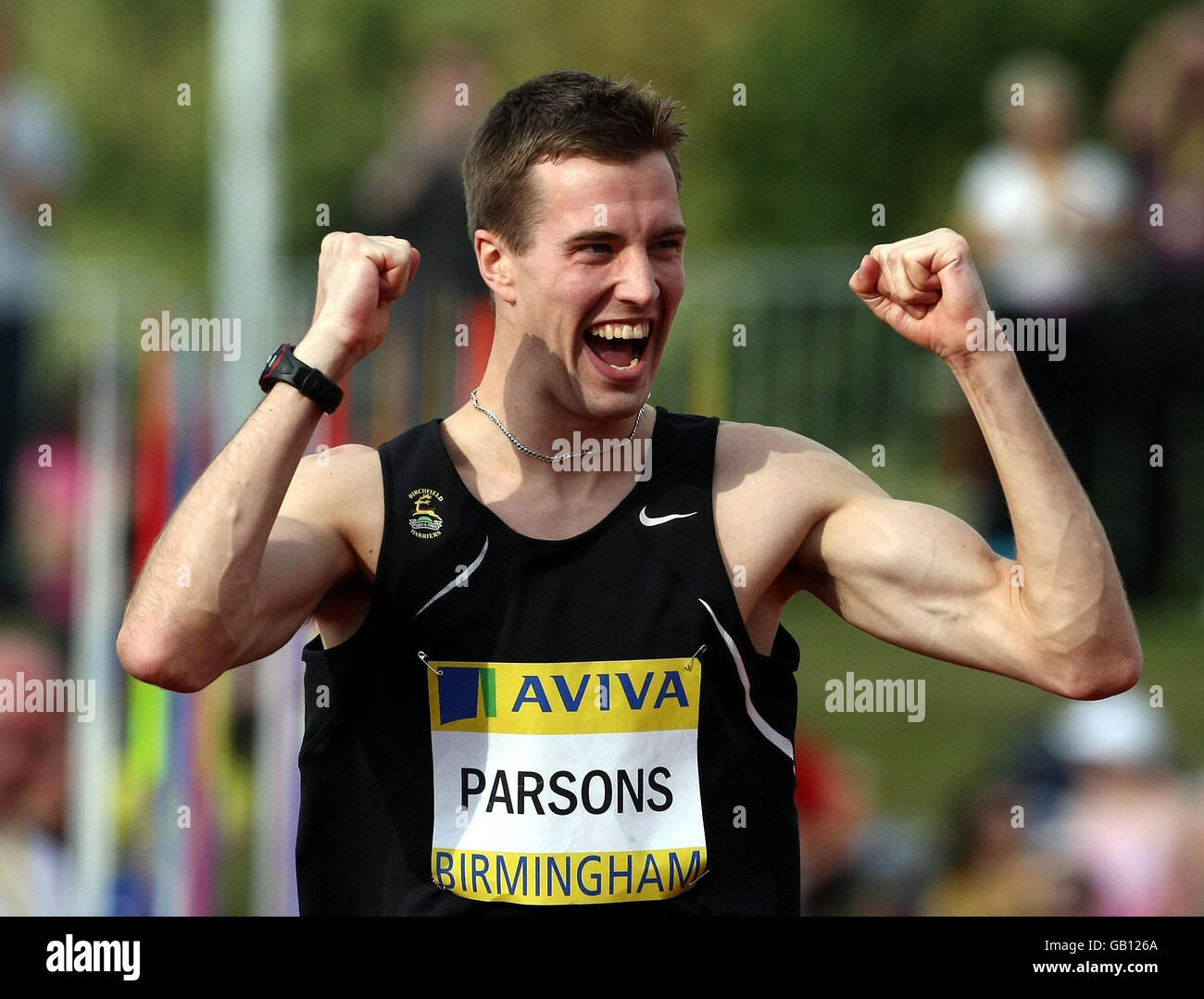 Tom Parsons celebrates his win with an Olympic qualifying height of 2 ...