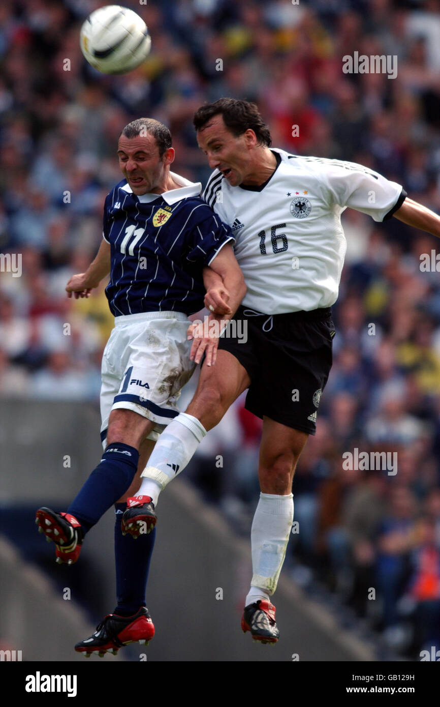 Scotlands colin cameron germanys jens jeremies battle for the ball hi ...