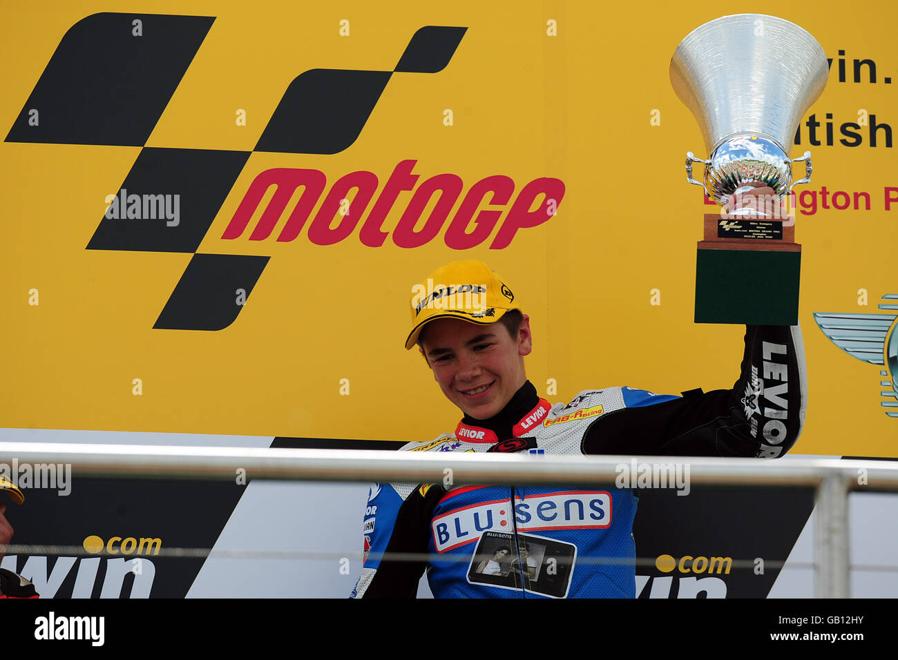 Aprilia's Scott Redding celebrates after winning the 125cc Race during ...