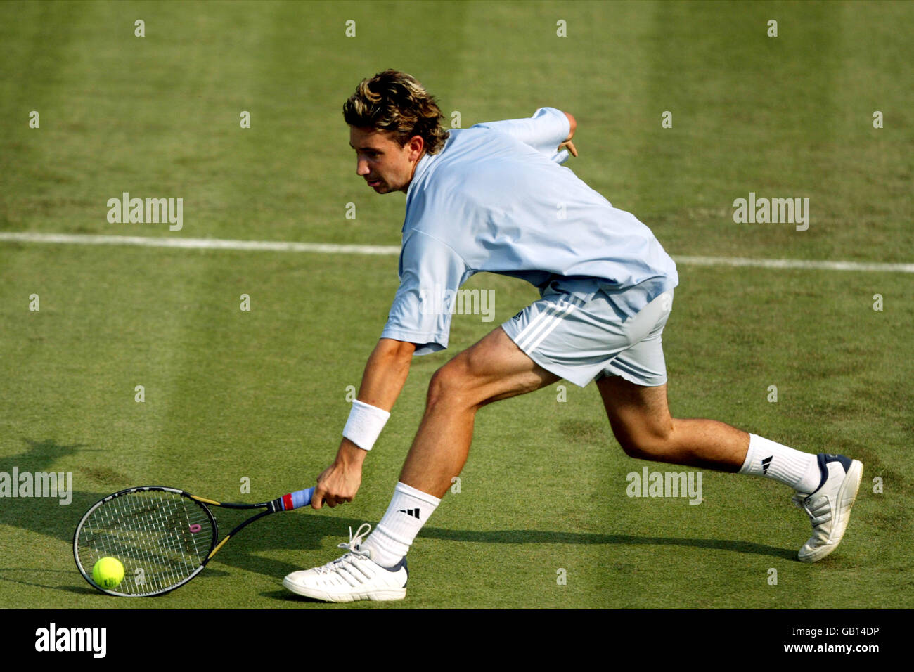 Tennis - Nottingham Open 2003 - First Round. Alex Bogdanovic returns to ...