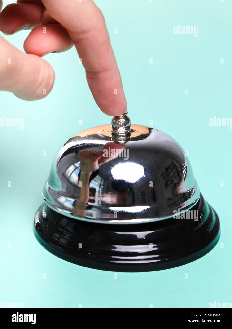 Concierge bell hand hi-res stock photography and images - Alamy