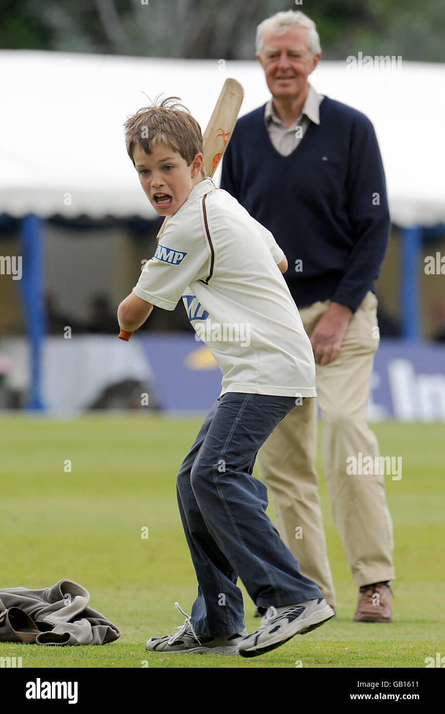 Spectators play on the outfield during the break for lunch Stock Photo ...
