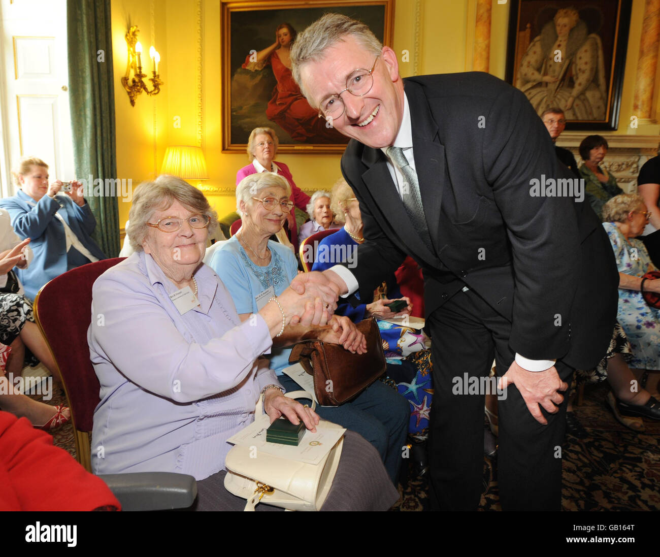 Hilary Benn meets Mary Vincent, from Liverpool, at a ceremony at 10 ...
