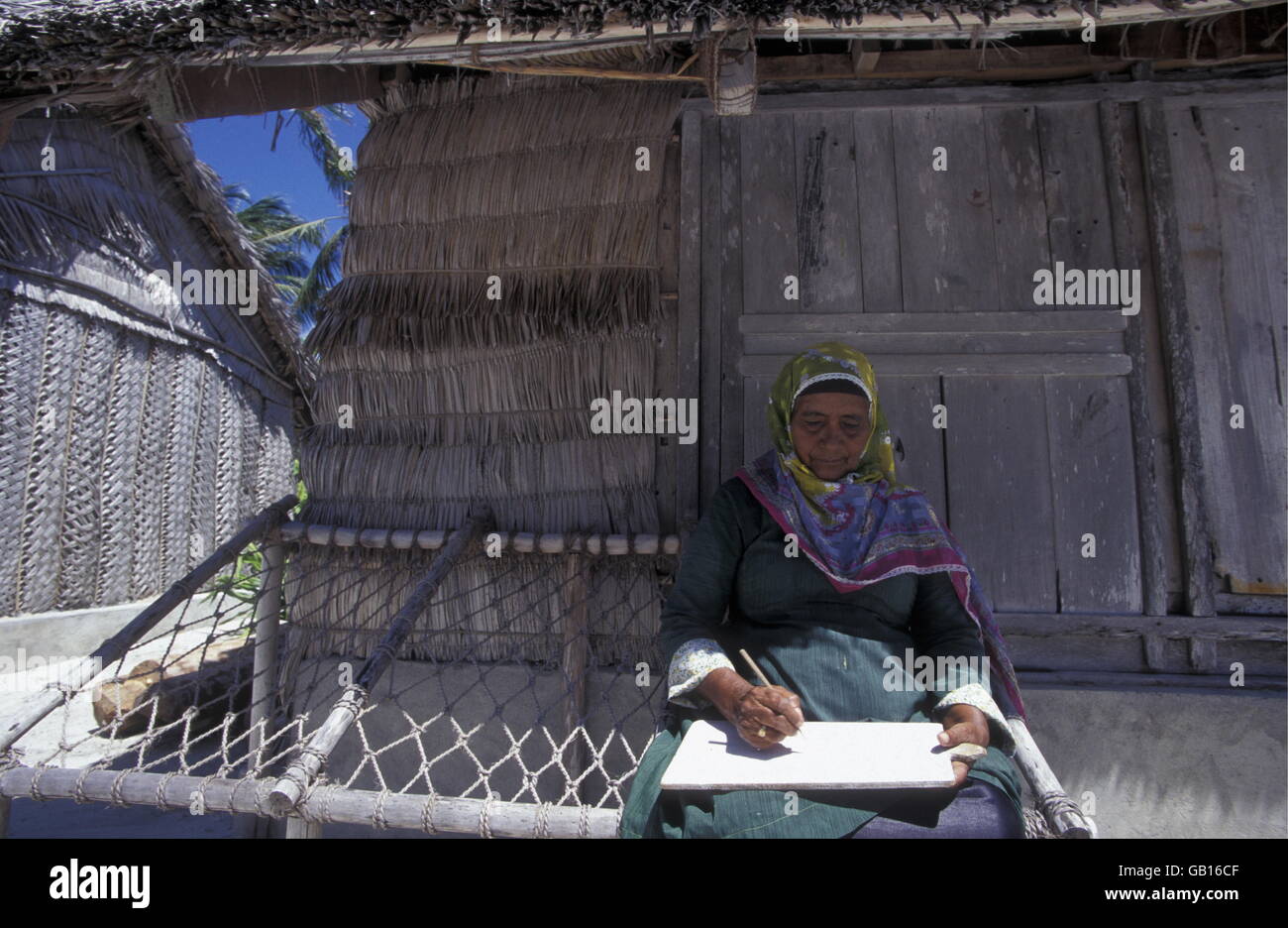 maldivian people in a village island of the island and atoll of the ...