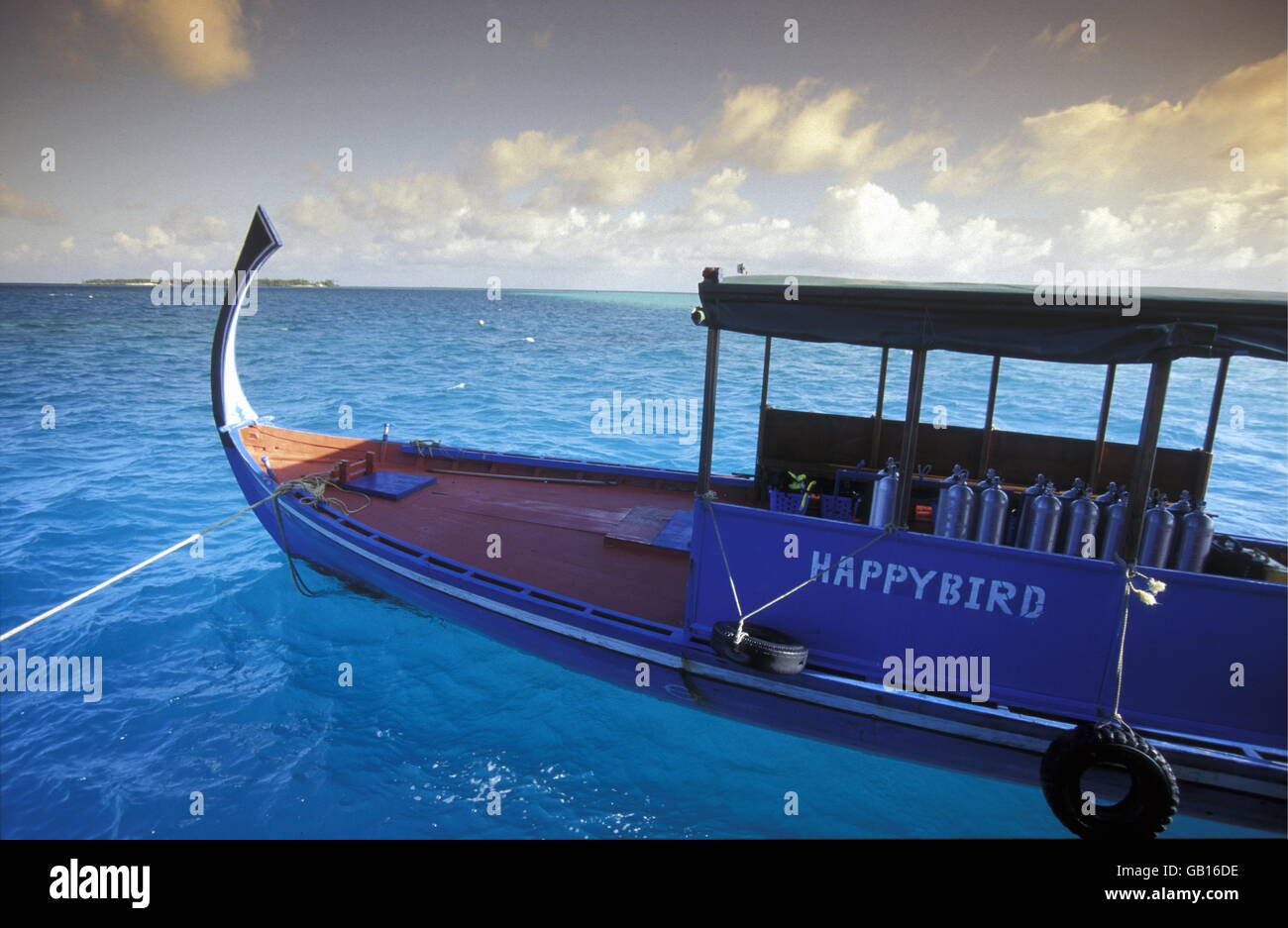 a dhoni Boat on the coast of the island and atoll of the Maldives ...