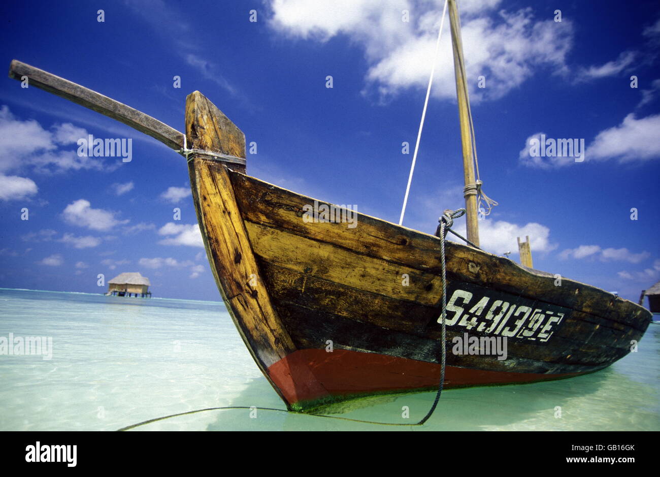 a dhoni Boat on the coast of the island and atoll of the Maldives ...