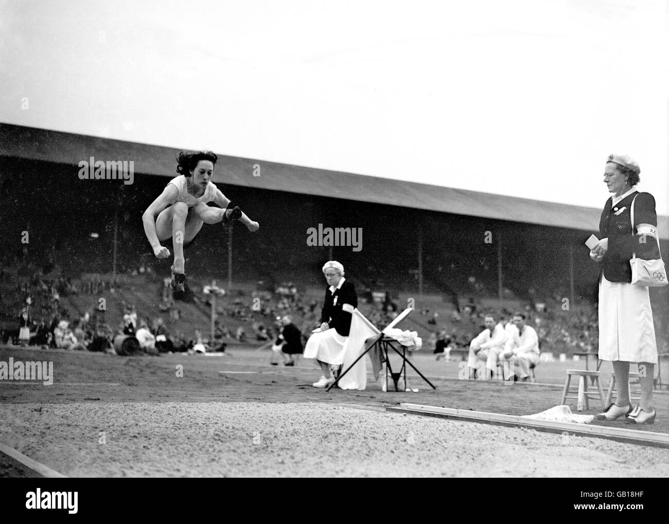 Long jump athletics olympics Black and White Stock Photos & Images - Alamy