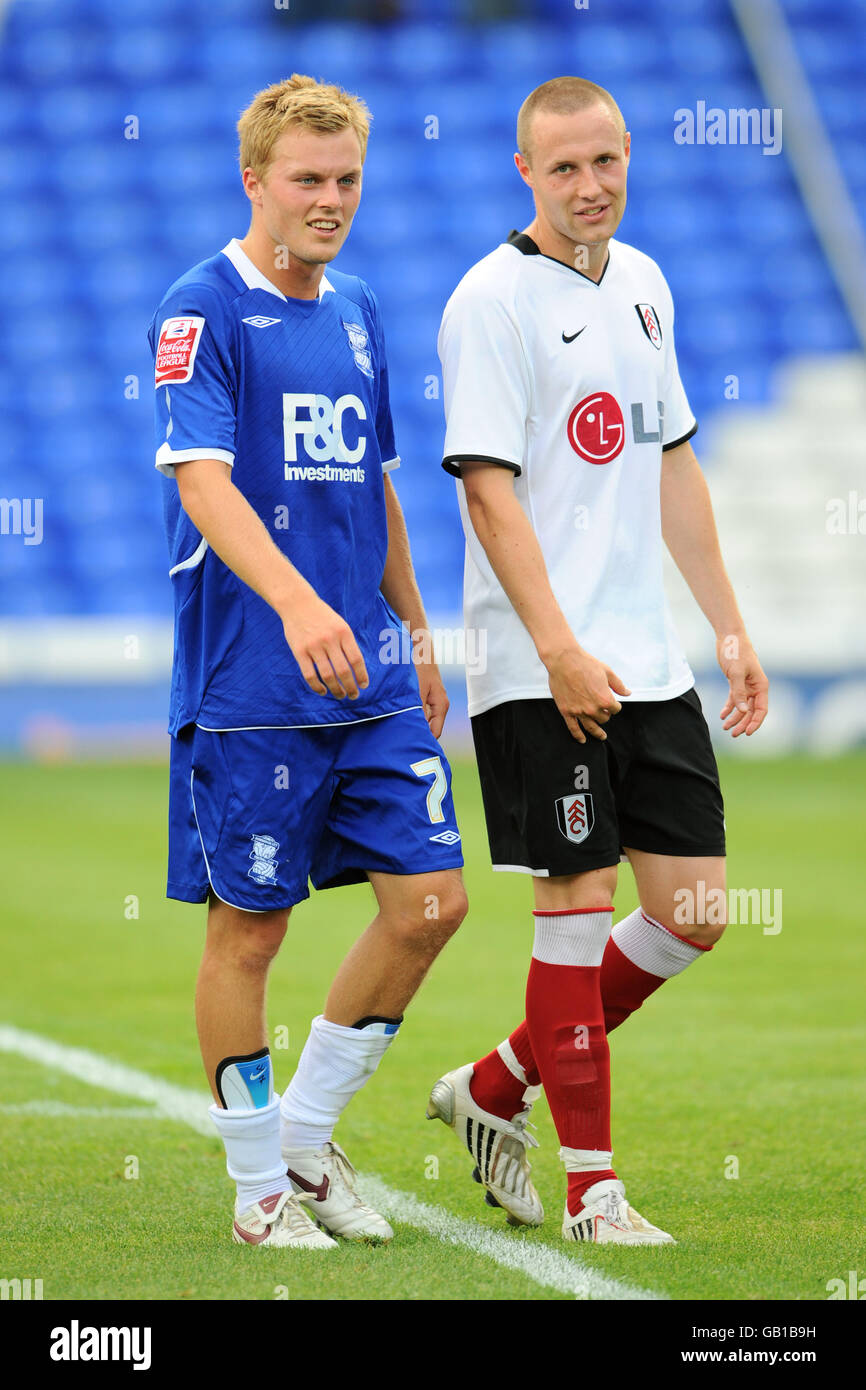 Birmingham City's Sebastian Larsson (l) and Fulham's Frederick Stoor ...