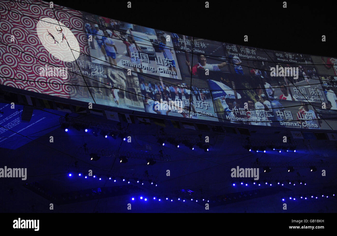 Olympic torch carried stadium hi-res stock photography and images - Alamy