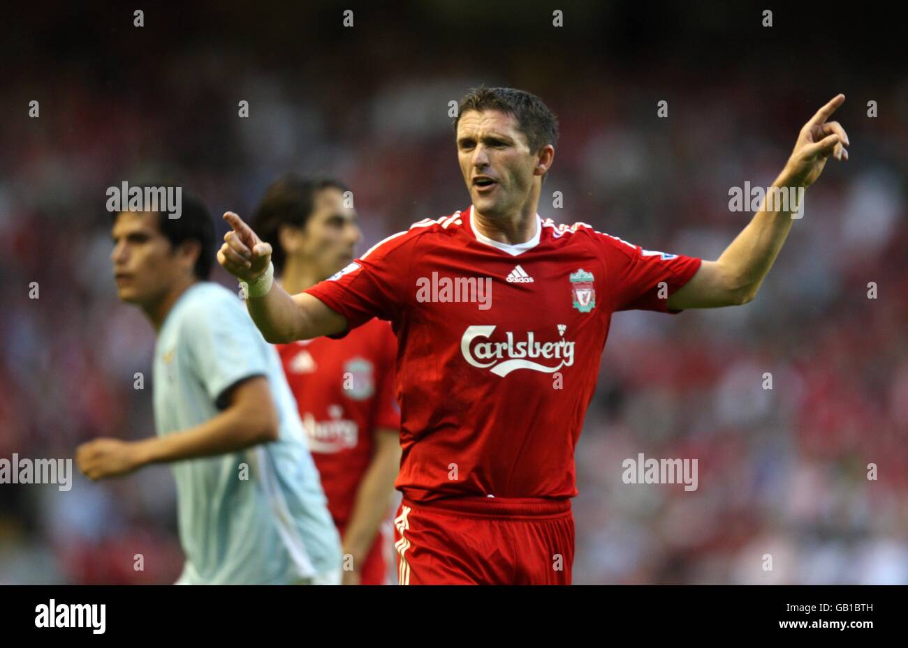 Liverpools robbie keane in action hi-res stock photography and images ...