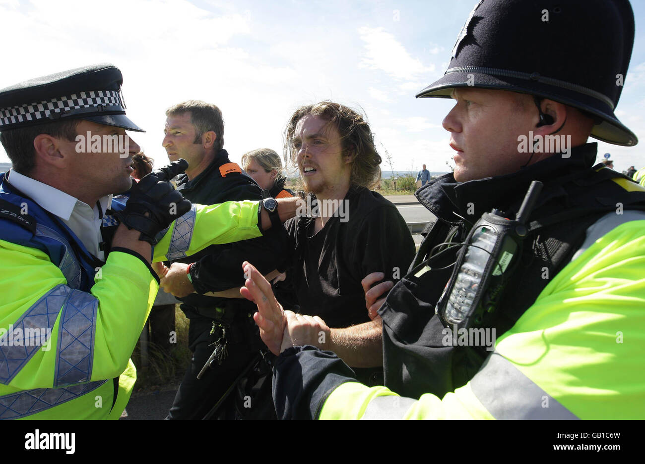 Camp for Climate Action. Police officers with environmental protesters ...
