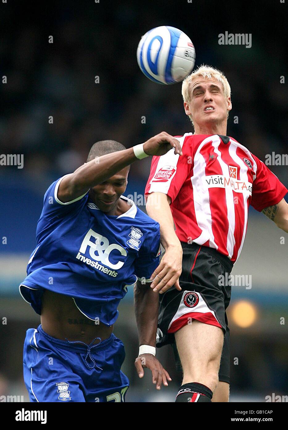 Sheffield United's Matthew Kilgallon and Birmingham City's Marcus Bent ...