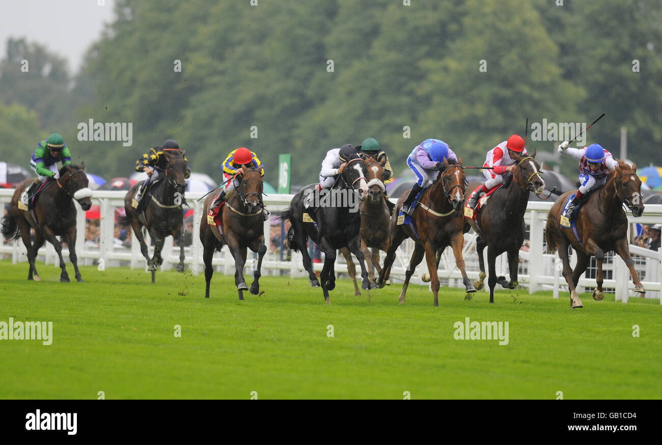 Shifting Star and jockey Gerald Mosse (right) on their way to victory ...