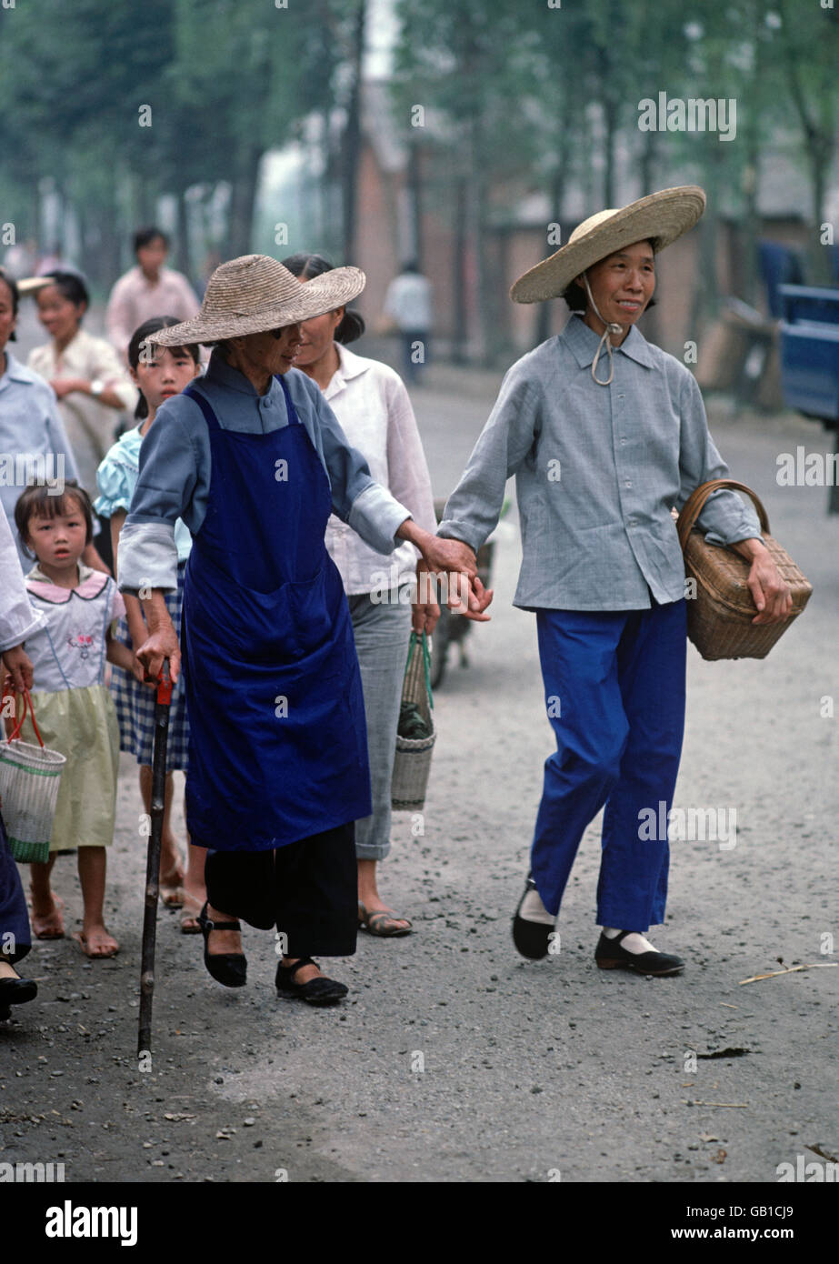Old lady walking stick in hi-res stock photography and images - Alamy