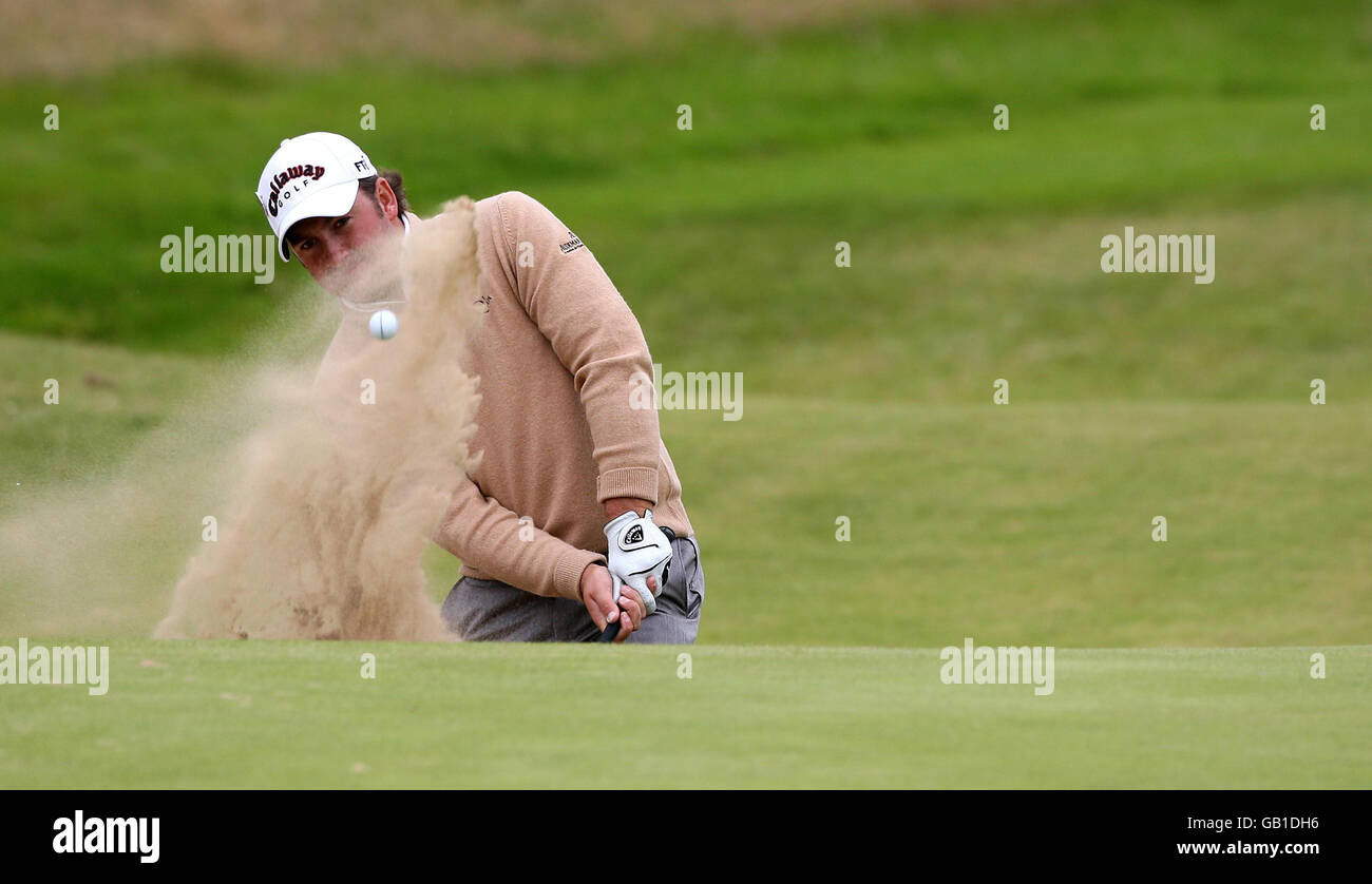 Northern Ireland's Graeme McDowell plays from a bunker during a ...