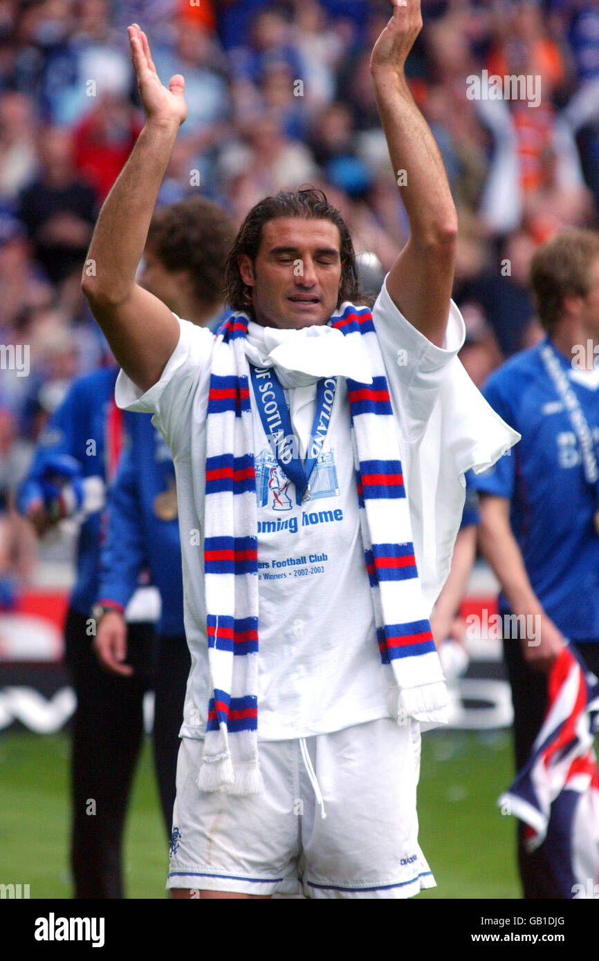 Rangers' Lorenzo Amoruso celebrates winning the title after victory ...