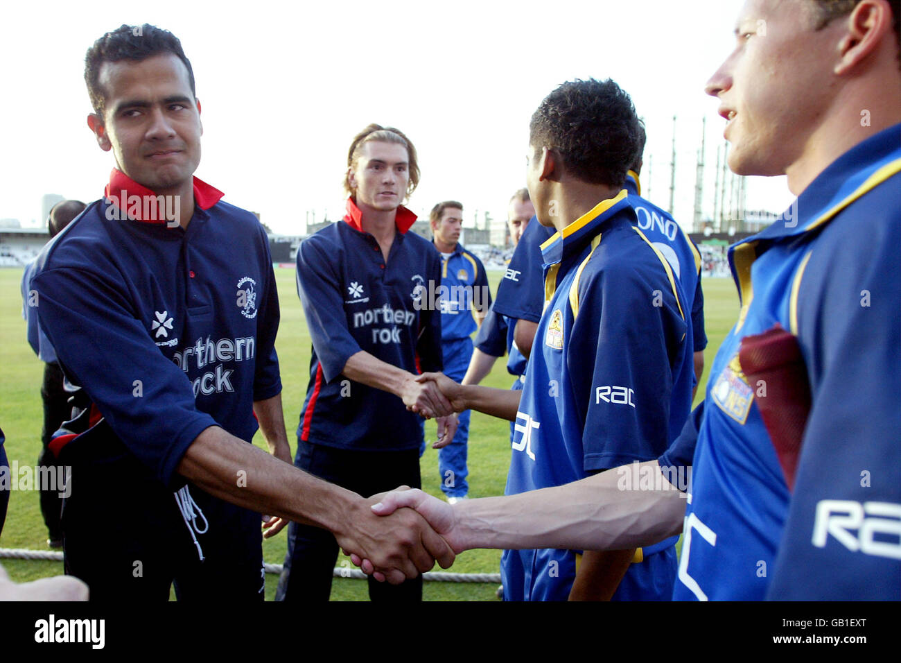 The players shake hands at the end of the game hi-res stock photography ...