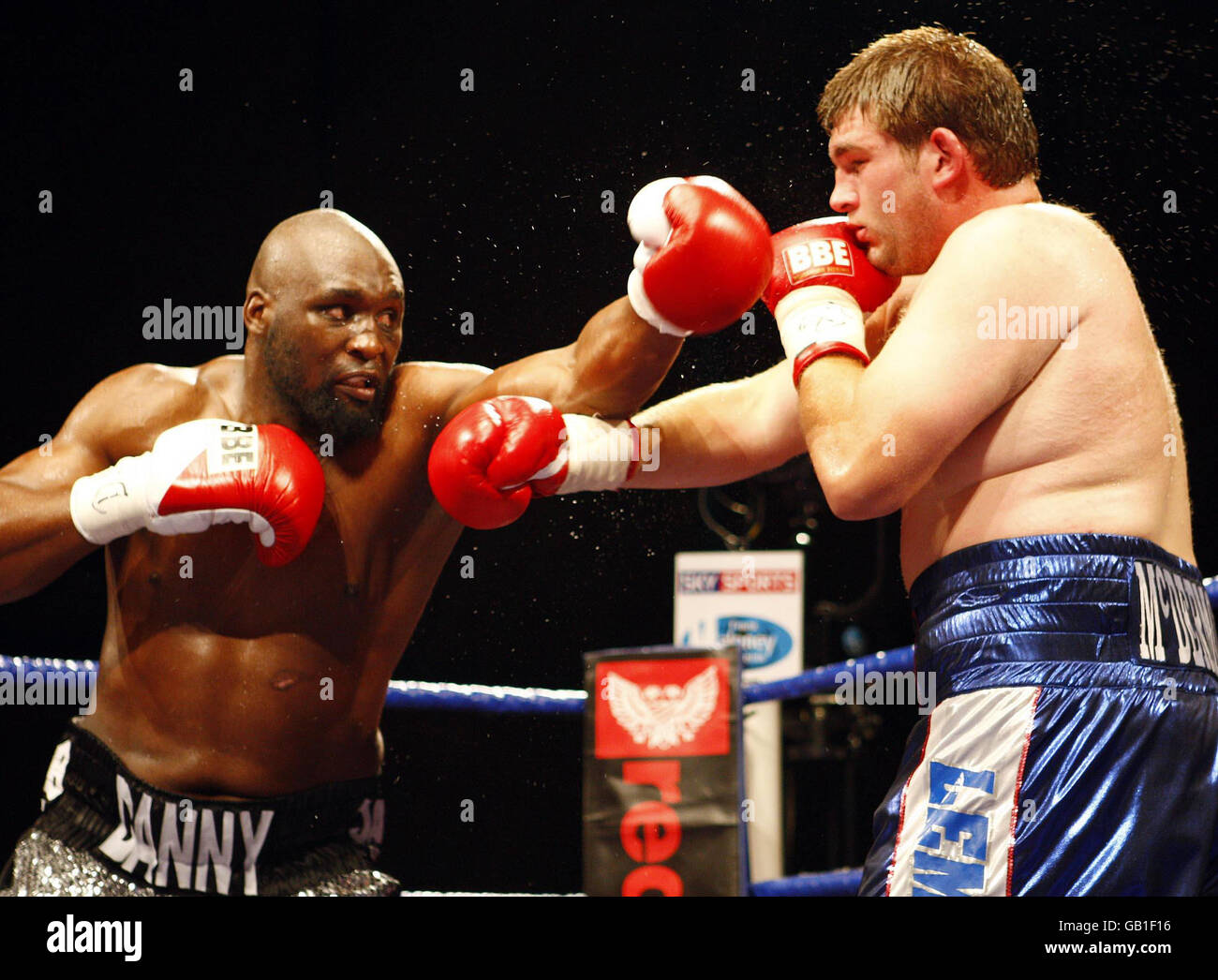 Danny Williams (left) throws a punch at John McDermott during the ...