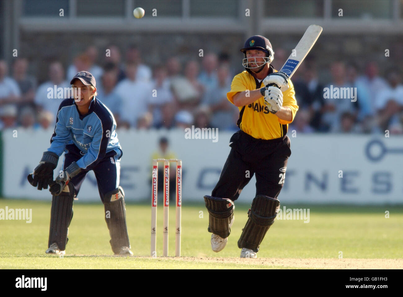 Matthew Maynard of Glamorgan his a four off an Ian Harvey delivery ...