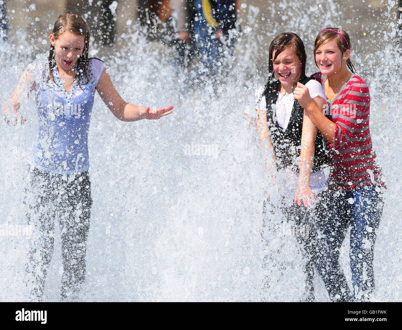 Girls Cooling Off In Fountain High Resolution Stock Photography and ...