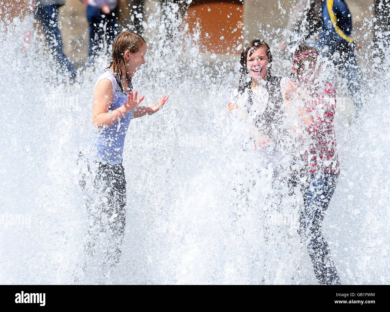 Young people cool off in the fountain in Middlesbrough as the UK ...