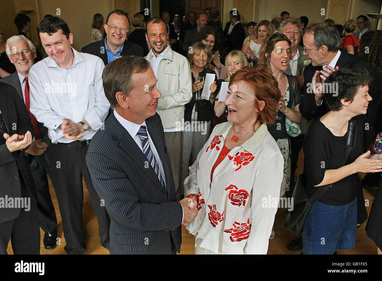 Minister for Arts Martin Cullen congratulates Olive Braiden on her ...