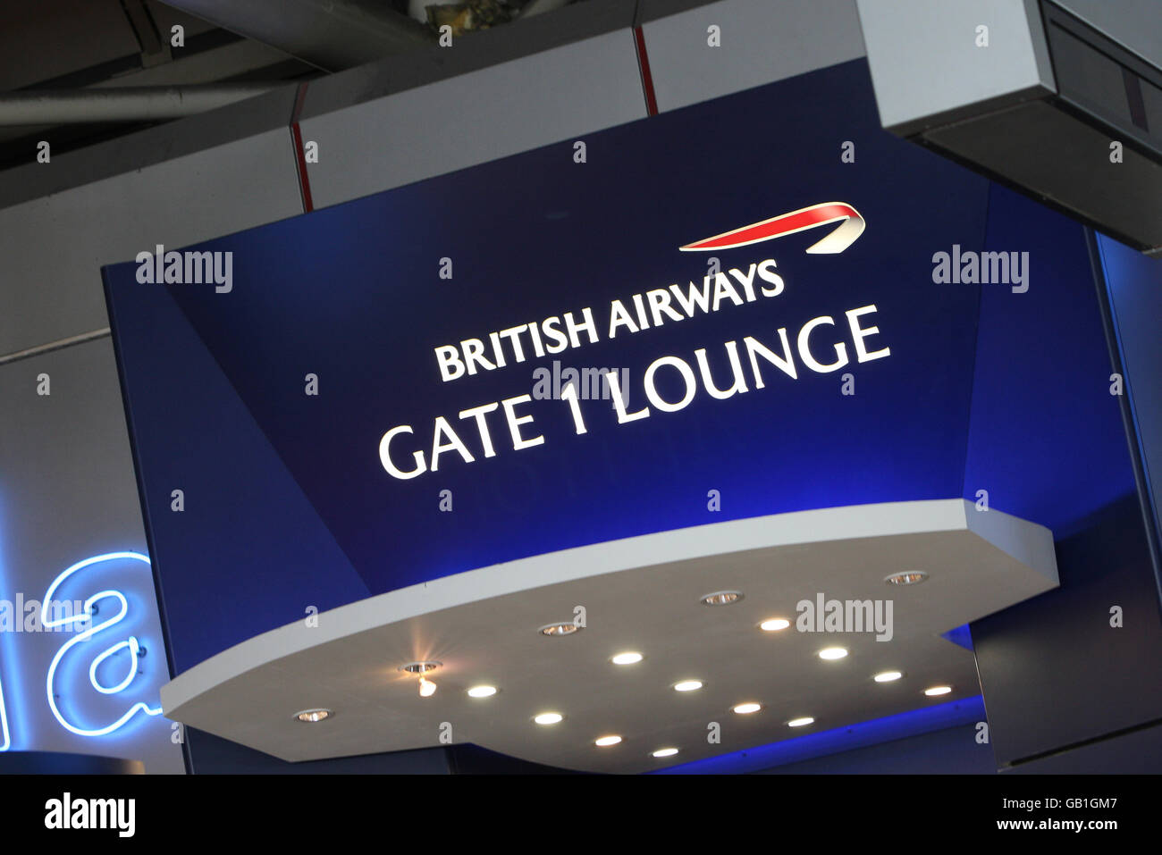 First class and premium travel. Signs for the British Airways Lounges ...
