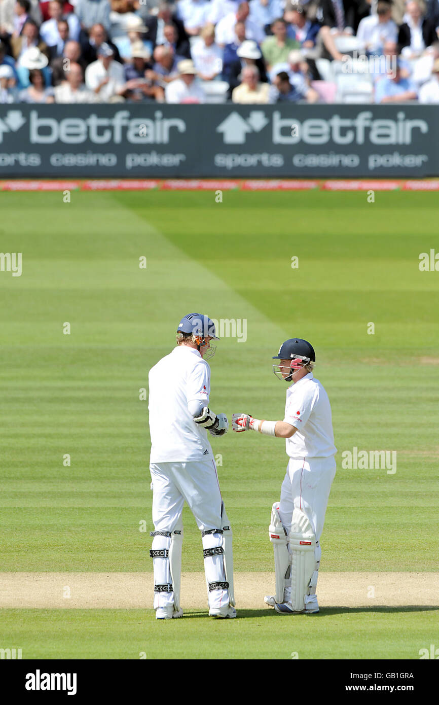England's Stuart Broad (l) and Ian Bell punch fists on the middle fo ...