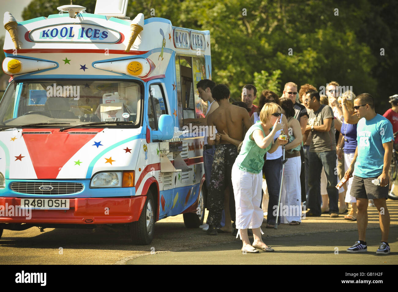 People queue for ice-cream at an ice-cream van on Clifton Downs ...