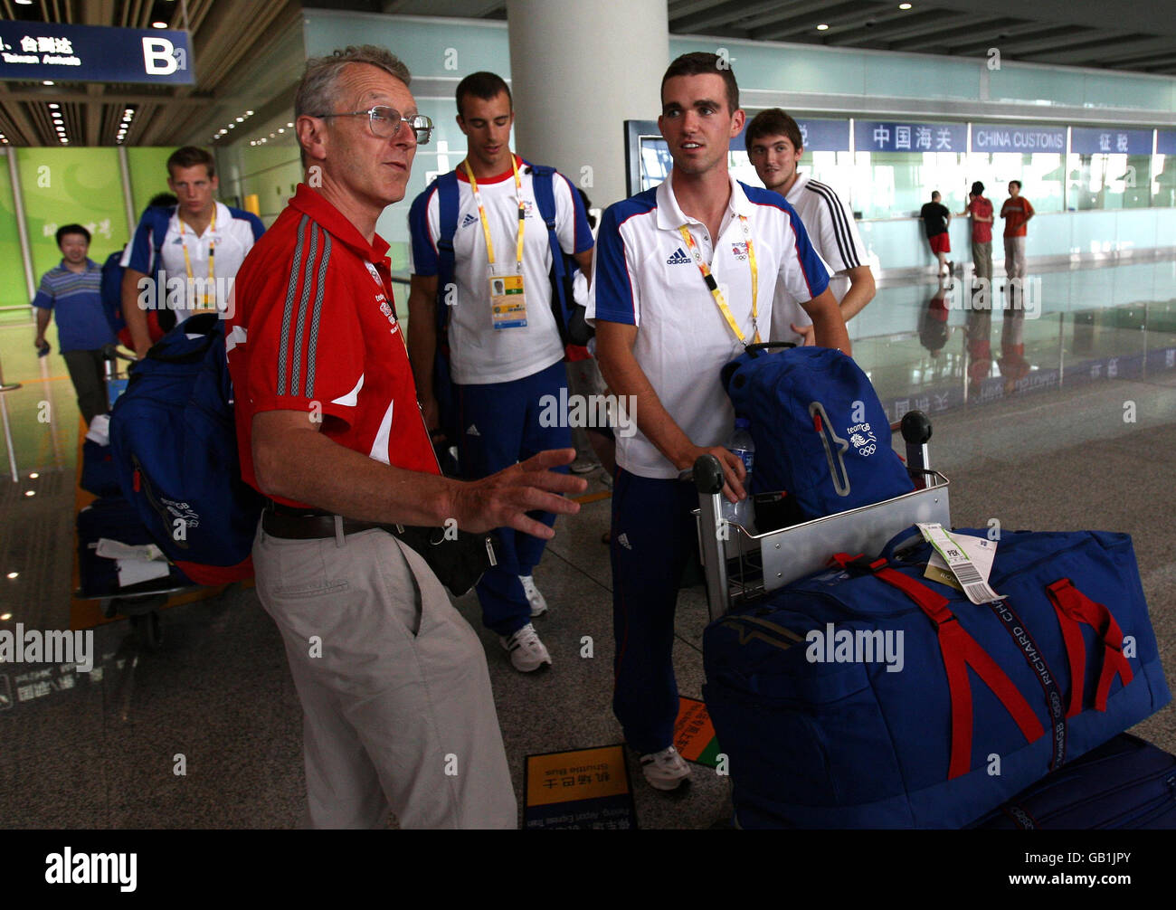 Richard Chambers (right) of the Great Britain Rowing team arrives at ...