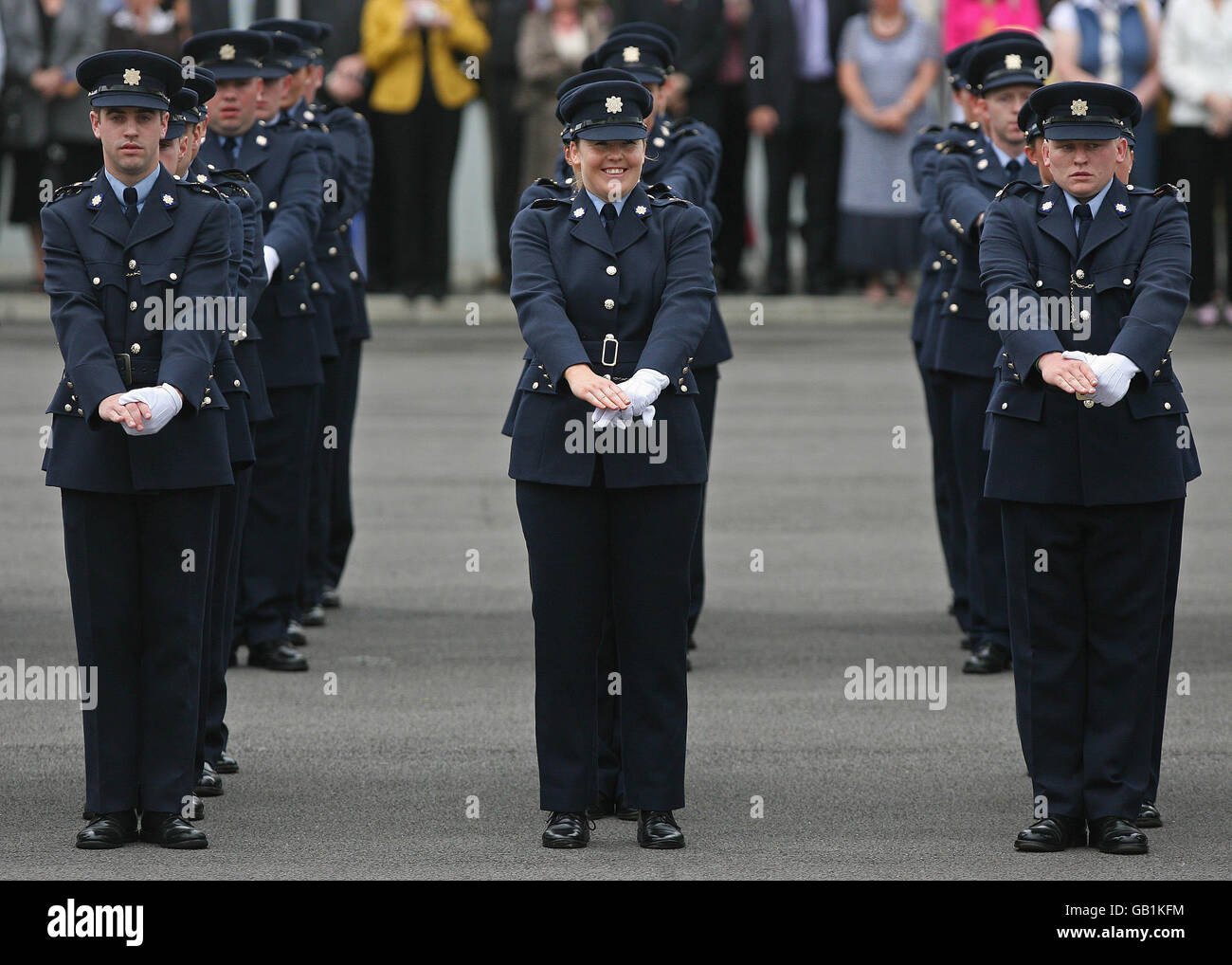 New recruits remove their white gloves to shake hands with Defence ...