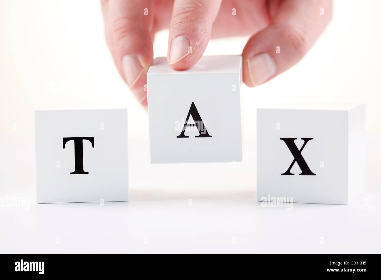 Word tax on cube hi-res stock photography and images - Alamy