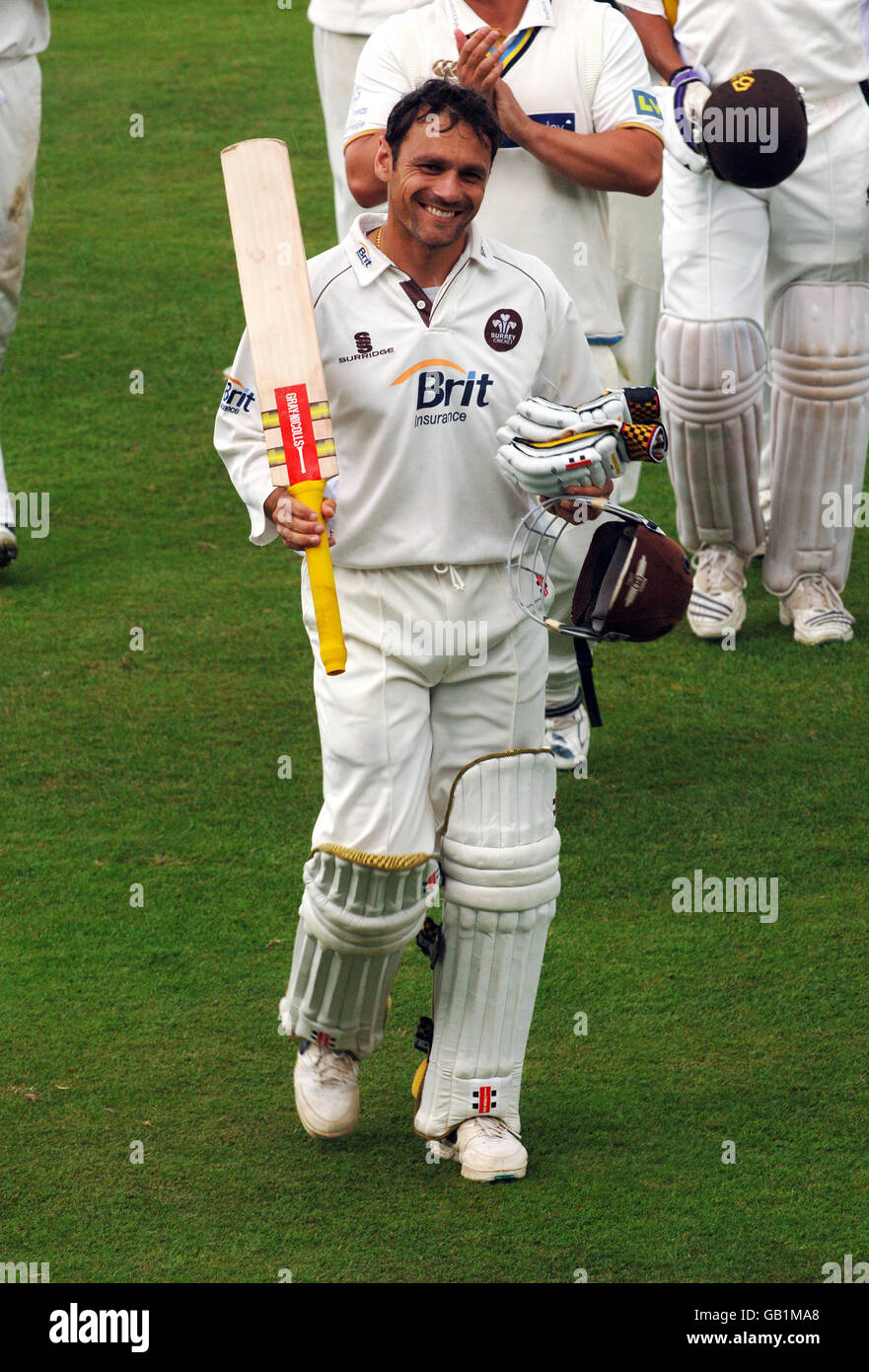 Surrey's Mark Ramprakash celebrates after scoring his 100th first class ...