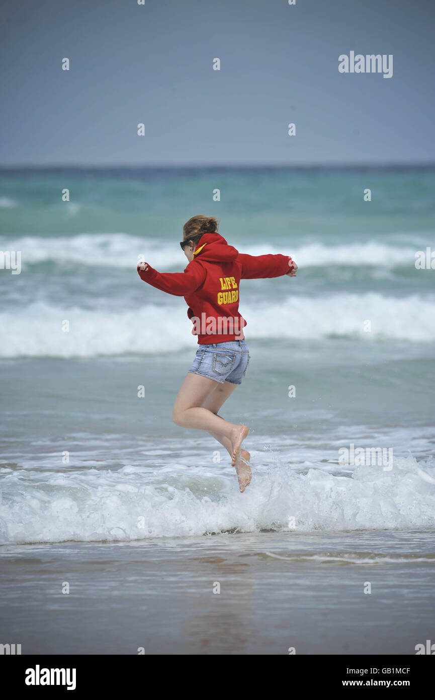 A general view of a women on Fistral beach, Newquay, on the first day ...